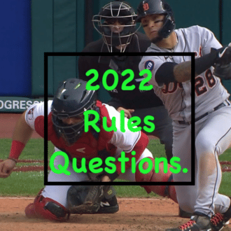 FLY BALL STRIKING TOP OF OUTFIELD WALL - Baseball Rules Academy