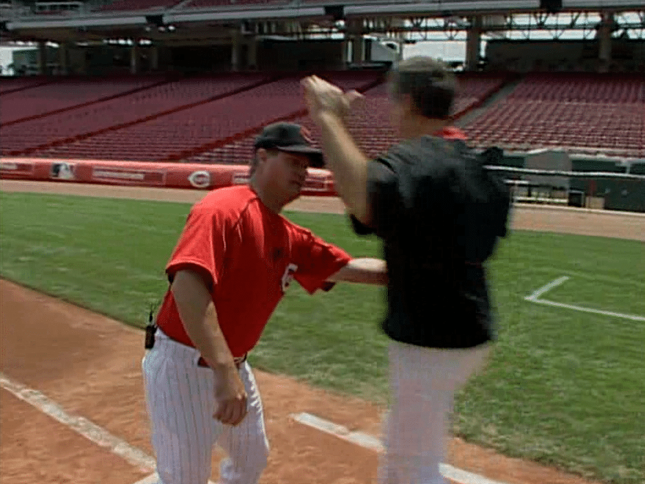 First Baseman Avoiding an Injury on a Bad Throw - Baseball Rules Academy